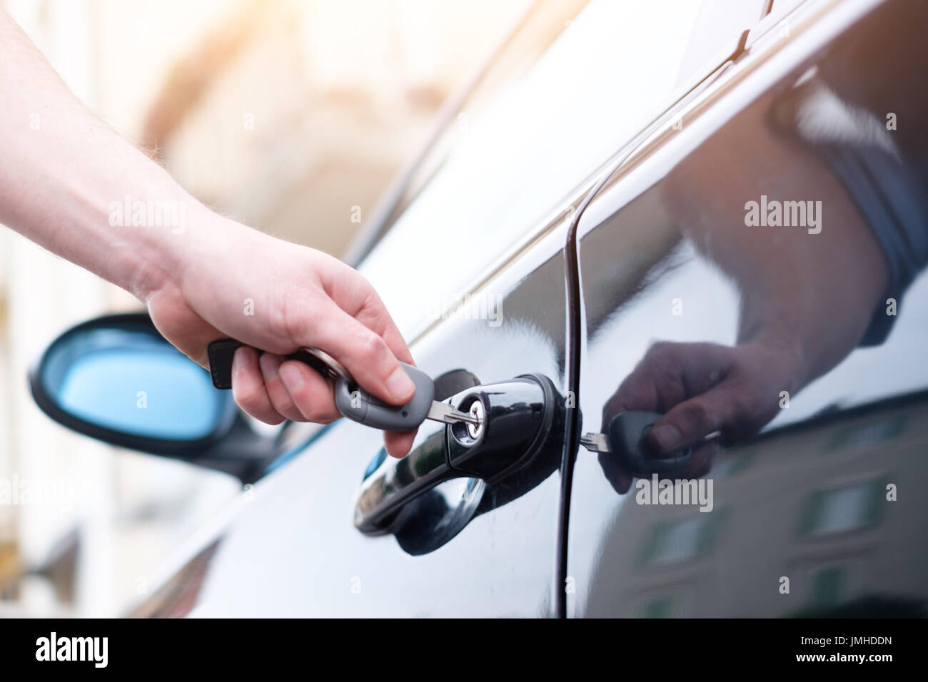 Holding door lock hi-res stock photography and images - Alamy