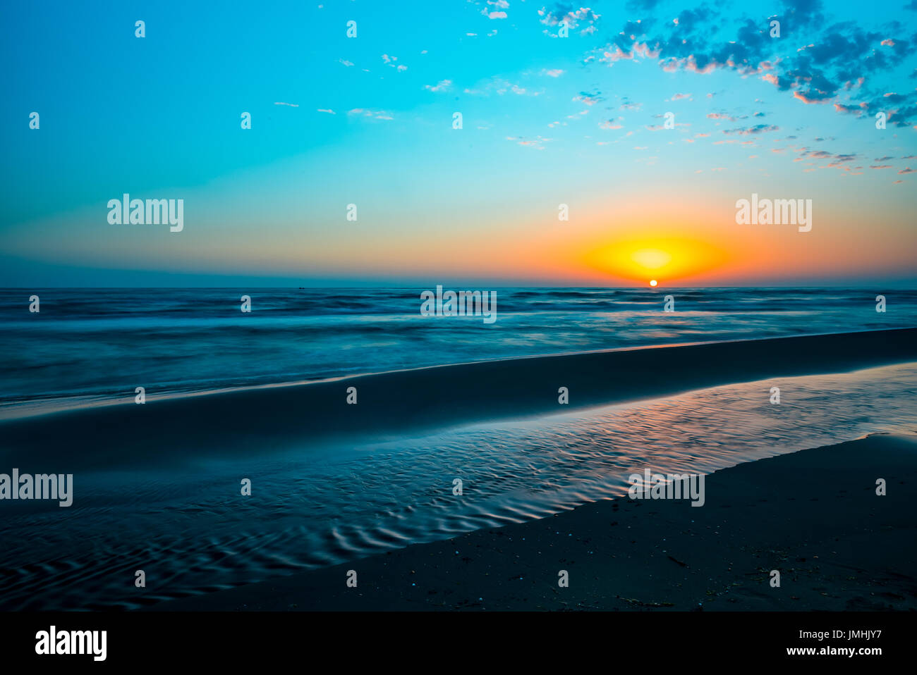 Dramatic bright sunrise hi-res stock photography and images - Alamy