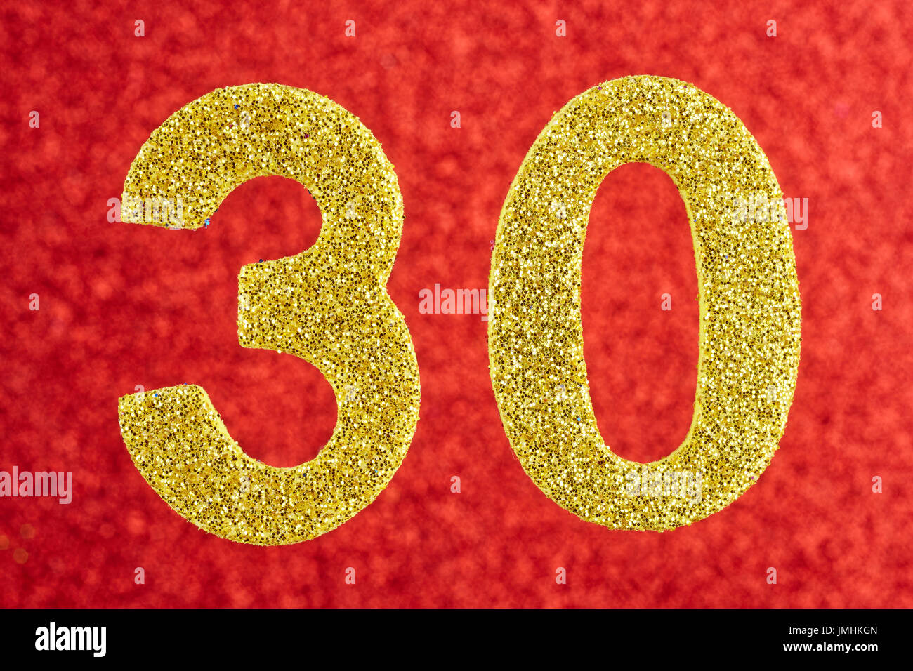 Number thirty yellow color over a red background. Anniversary ...