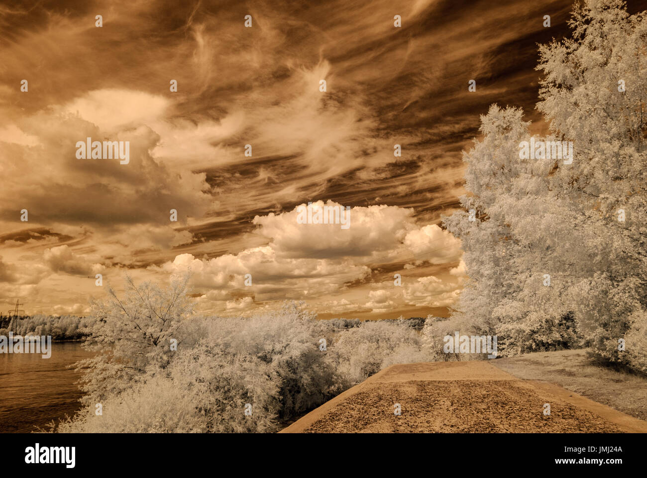 infrared camera image. colored. reflections of clouds in water in ...