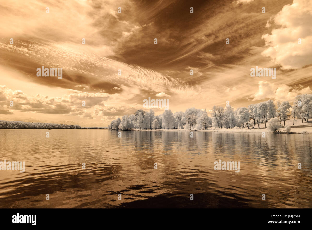 infrared camera image. colored. reflections of clouds in water in ...