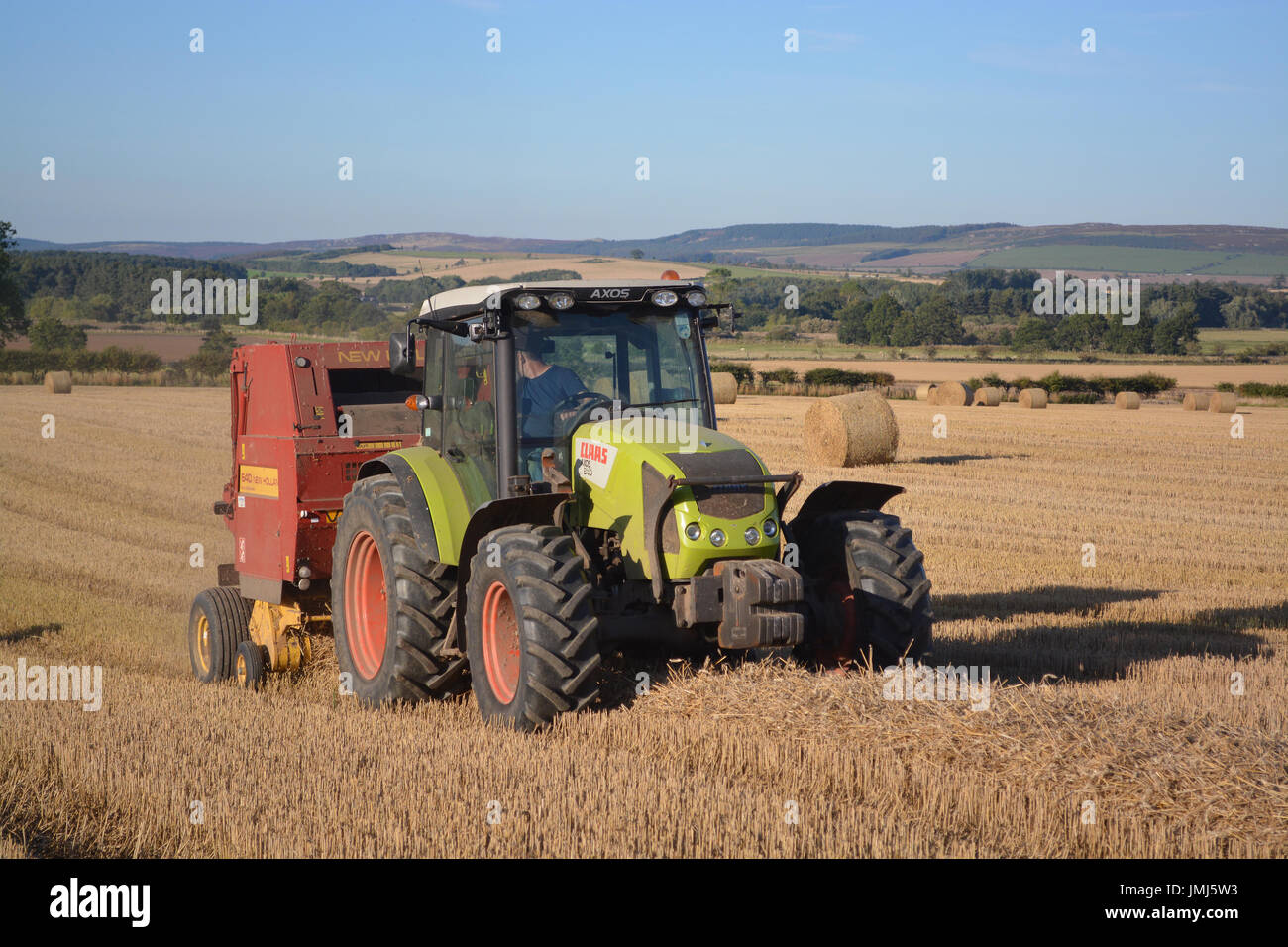 Tractor baling machine hi-res stock photography and images - Alamy