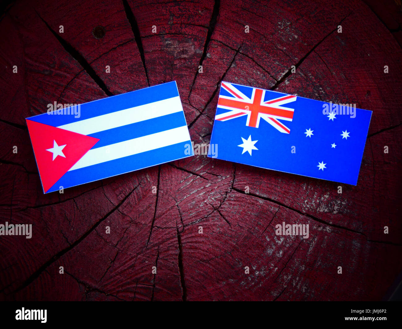 Cuban flag with Australian flag on a tree stump isolated Stock Photo ...