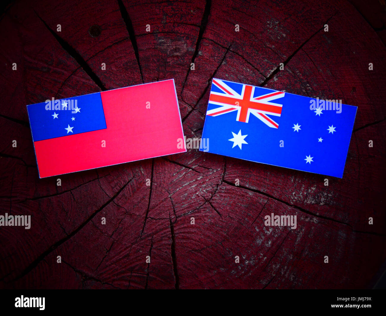 Samoa flag with Australian flag on a tree stump isolated Stock Photo ...