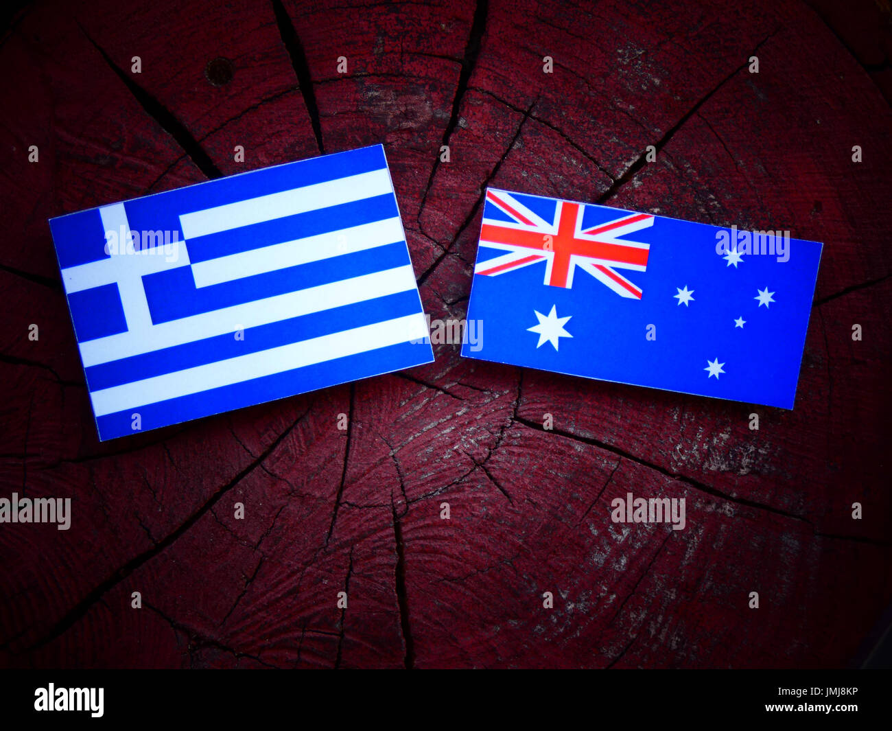 Greek flag with Australian flag on a tree stump isolated Stock Photo ...