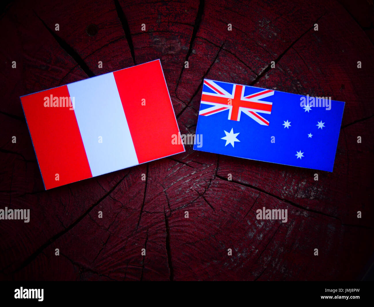 Peruvian flag with Australian flag on a tree stump isolated Stock Photo ...