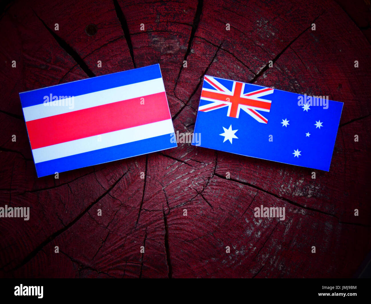 Costa Rican flag with Australian flag on a tree stump isolated Stock ...