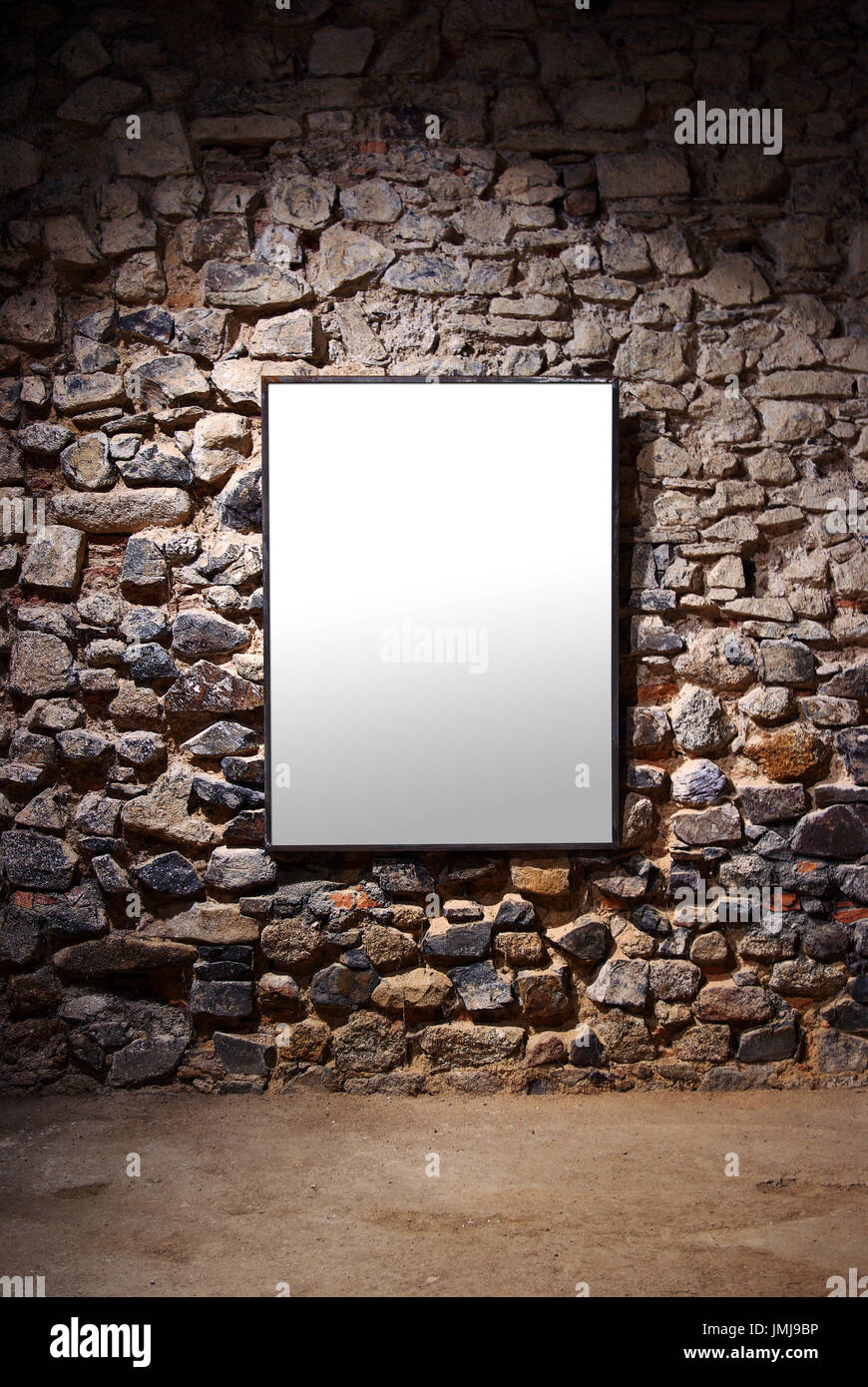 Empty frame attached to a stone wall in a gallery room Stock Photo - Alamy