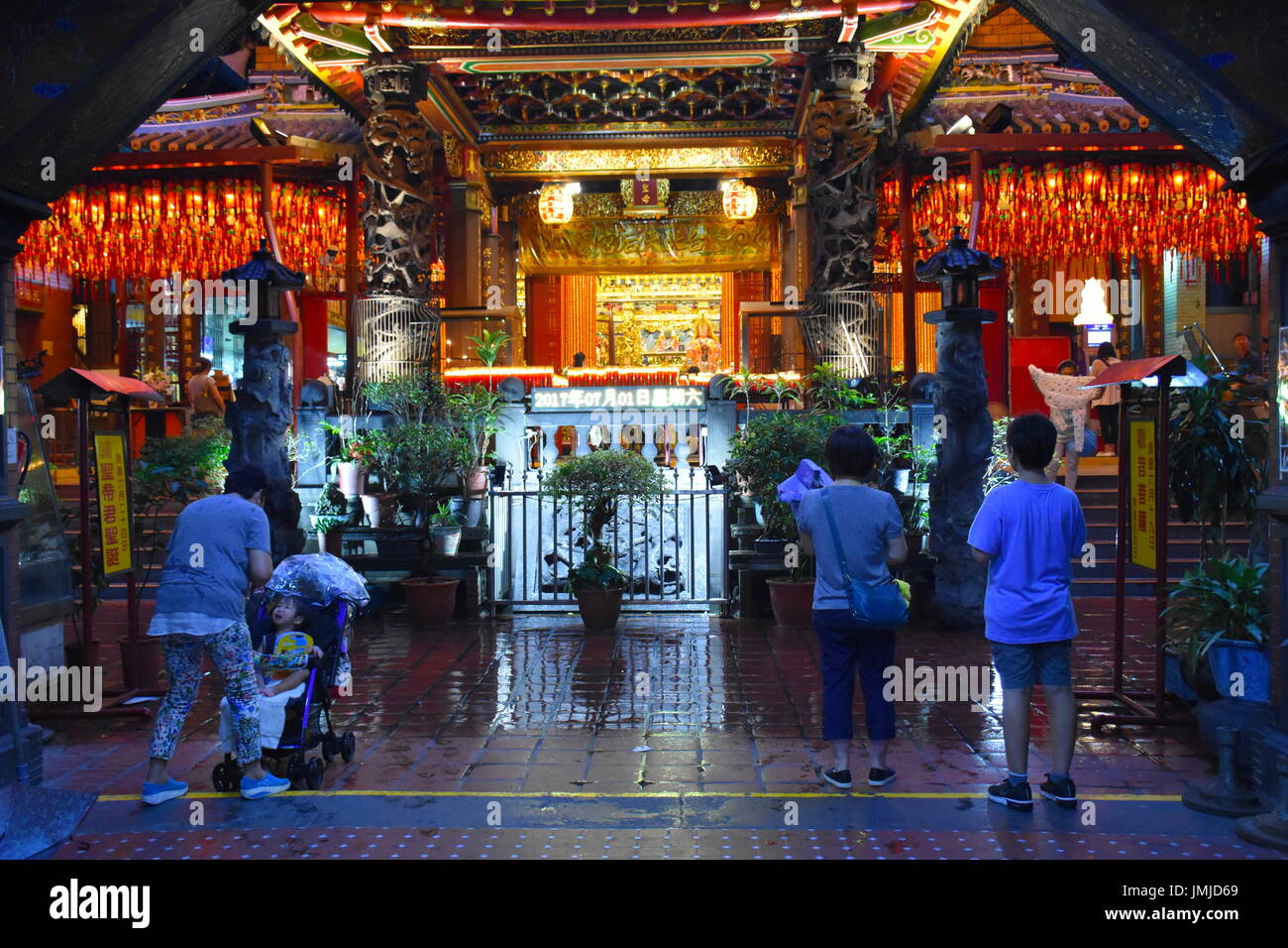 A Buddhist temple in downtown Taipei, Taiwan. The temples never bother ...