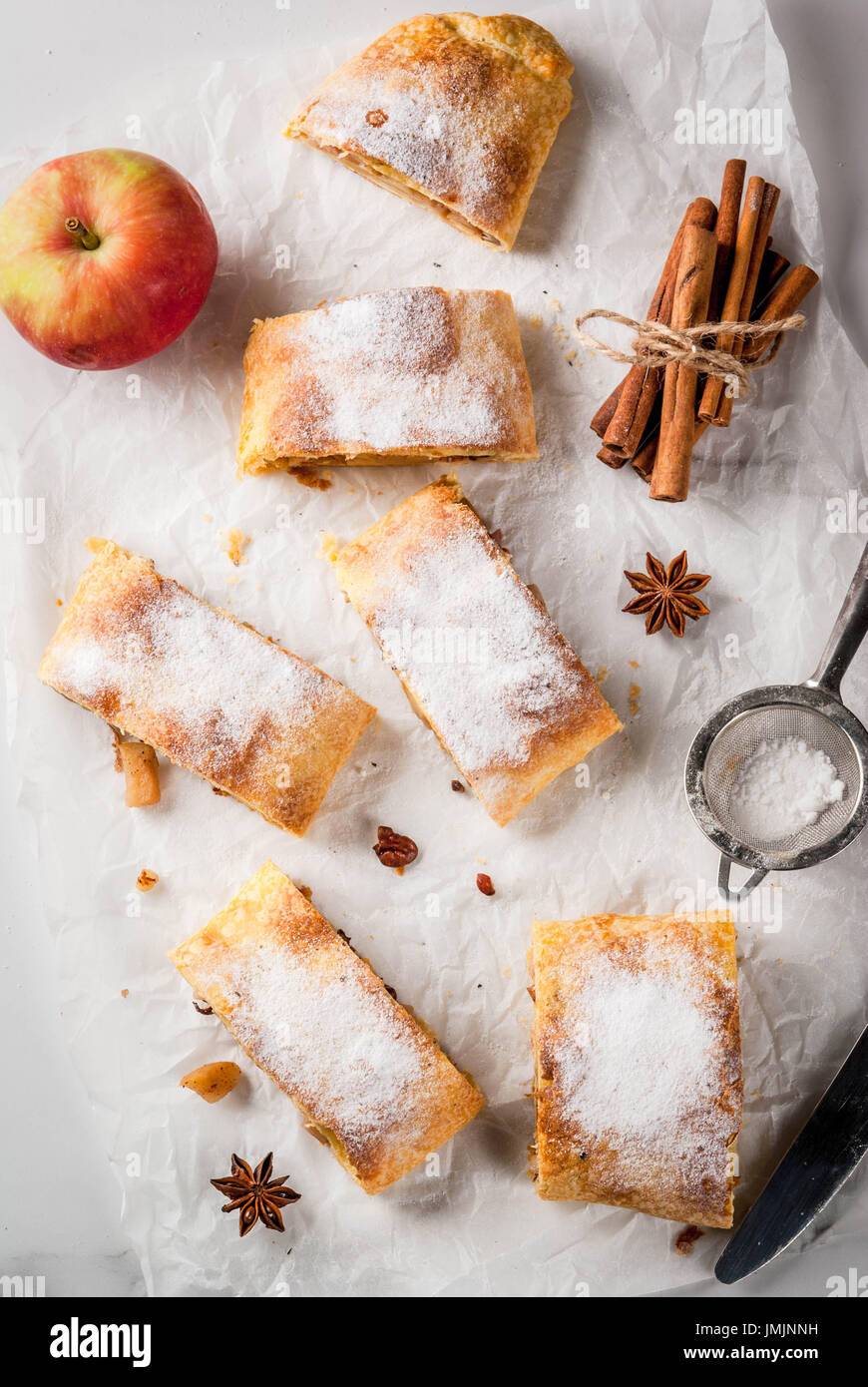 Home autumn, summer baking, puff pastries. Apple strudel with nuts ...