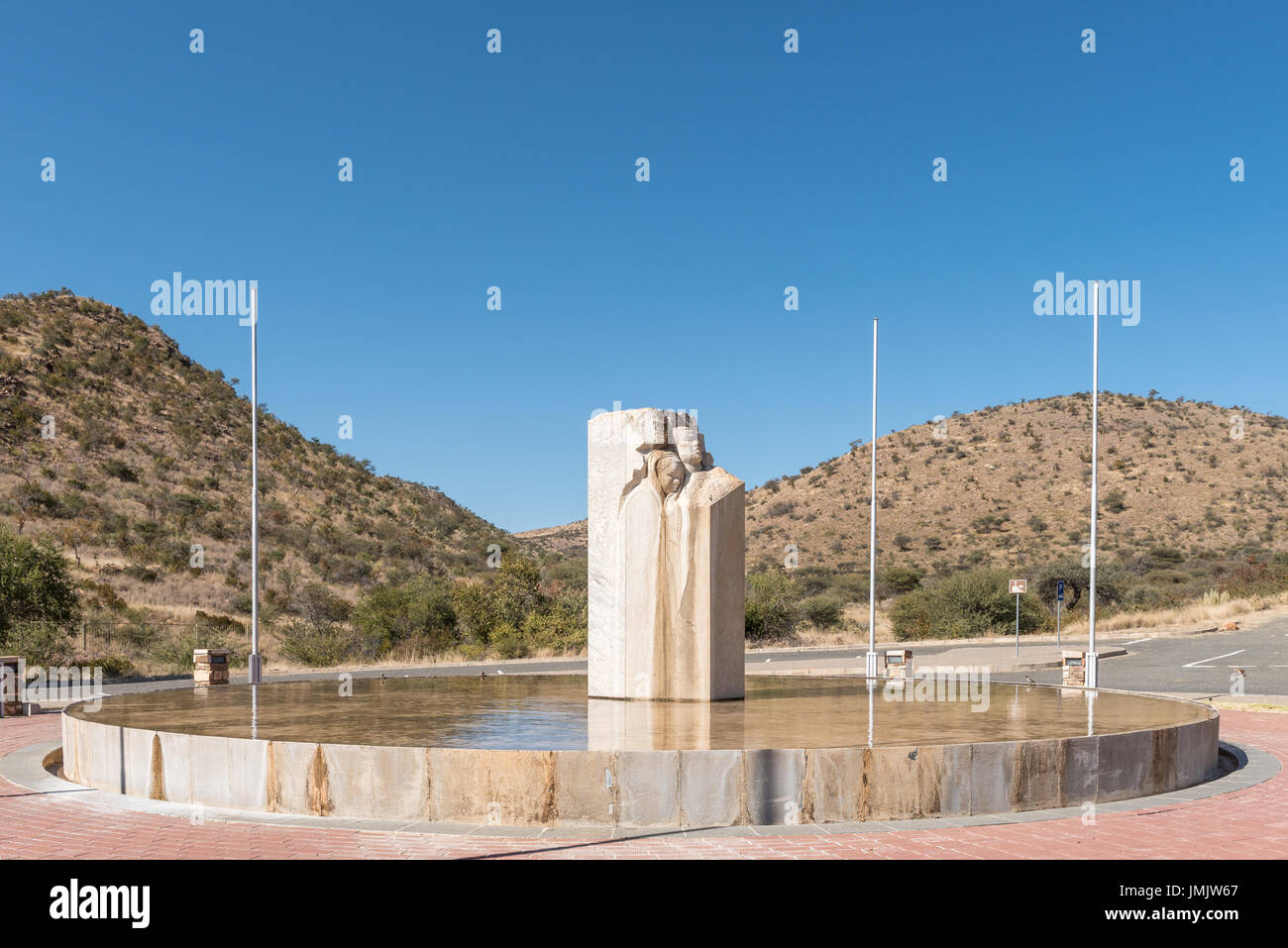 WINDHOEK, NAMIBIA - JUNE 16, 2017: A stone sculpture on the roundabout ...