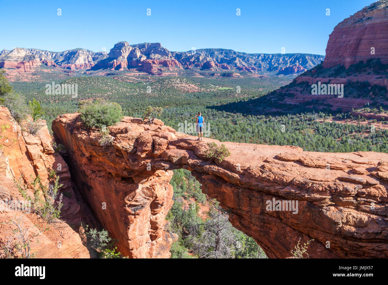 Hiker on the Devil's Bridge in Sedona, Arizona Stock Photo - Alamy