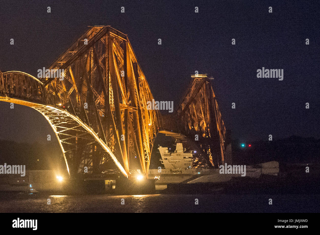 The HMS Queen Elizabeth sails under the Fourth Rail bridge with just 6 ...