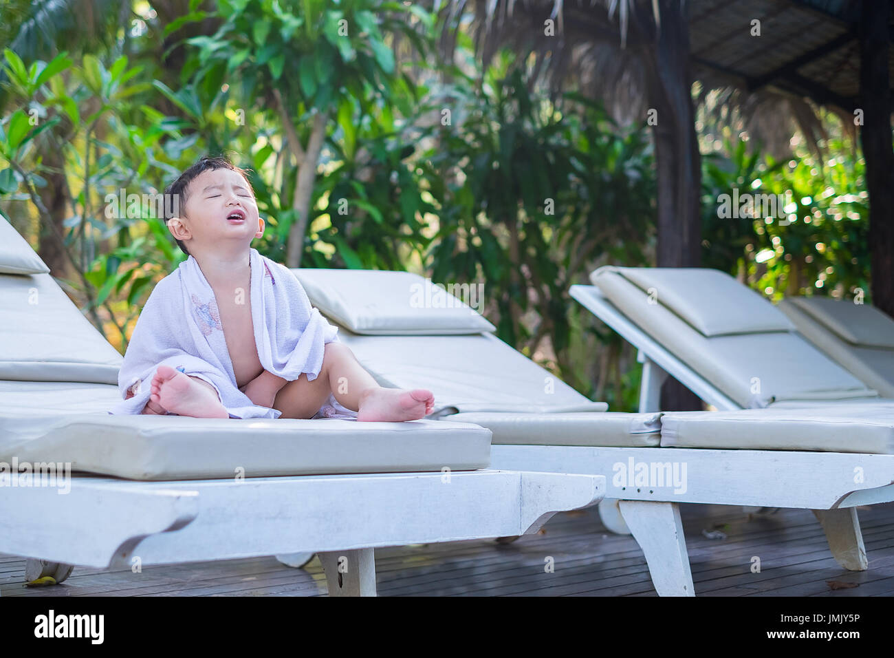 Pool deck kid happy hi-res stock photography and images - Alamy
