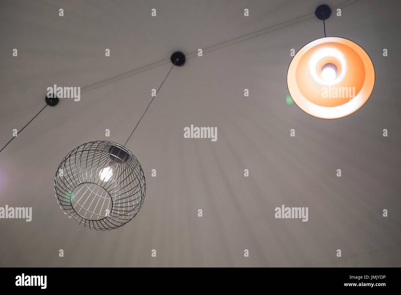 Modern ceiling lamps lighting equipment in dark room with shadow ...