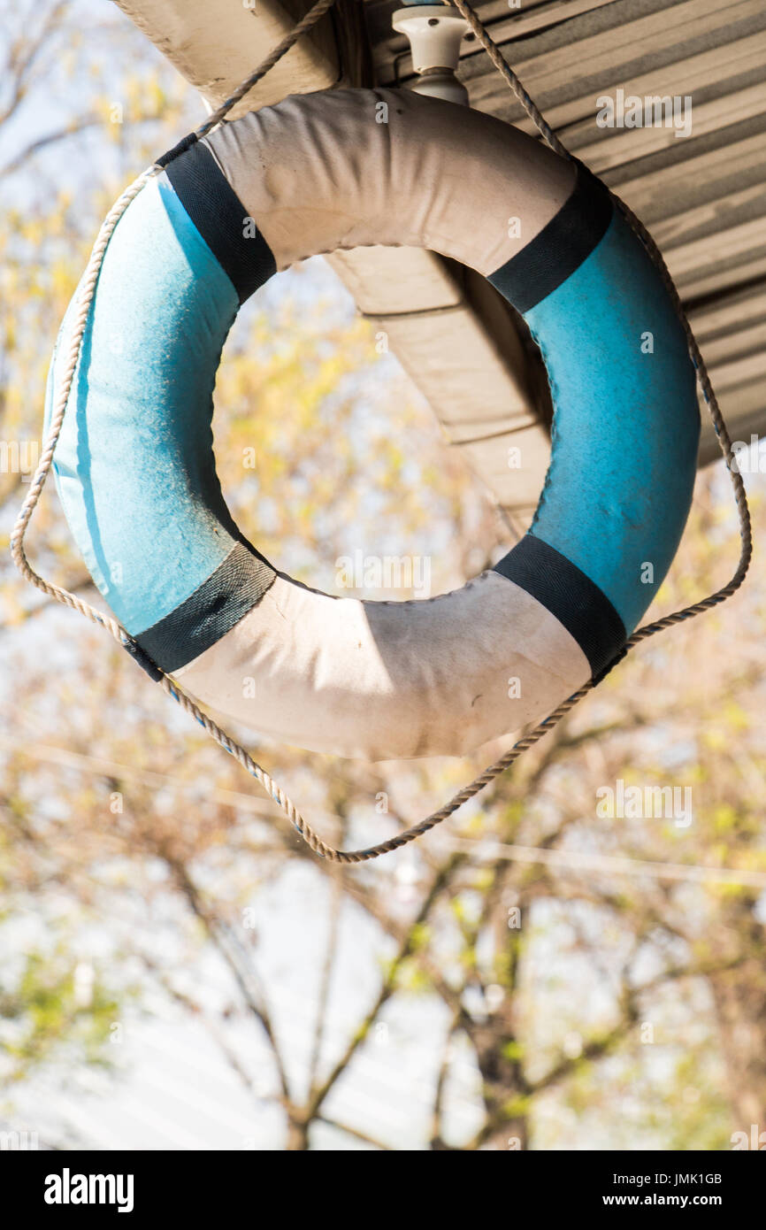 Life preserver or life saver hanging in air Stock Photo - Alamy