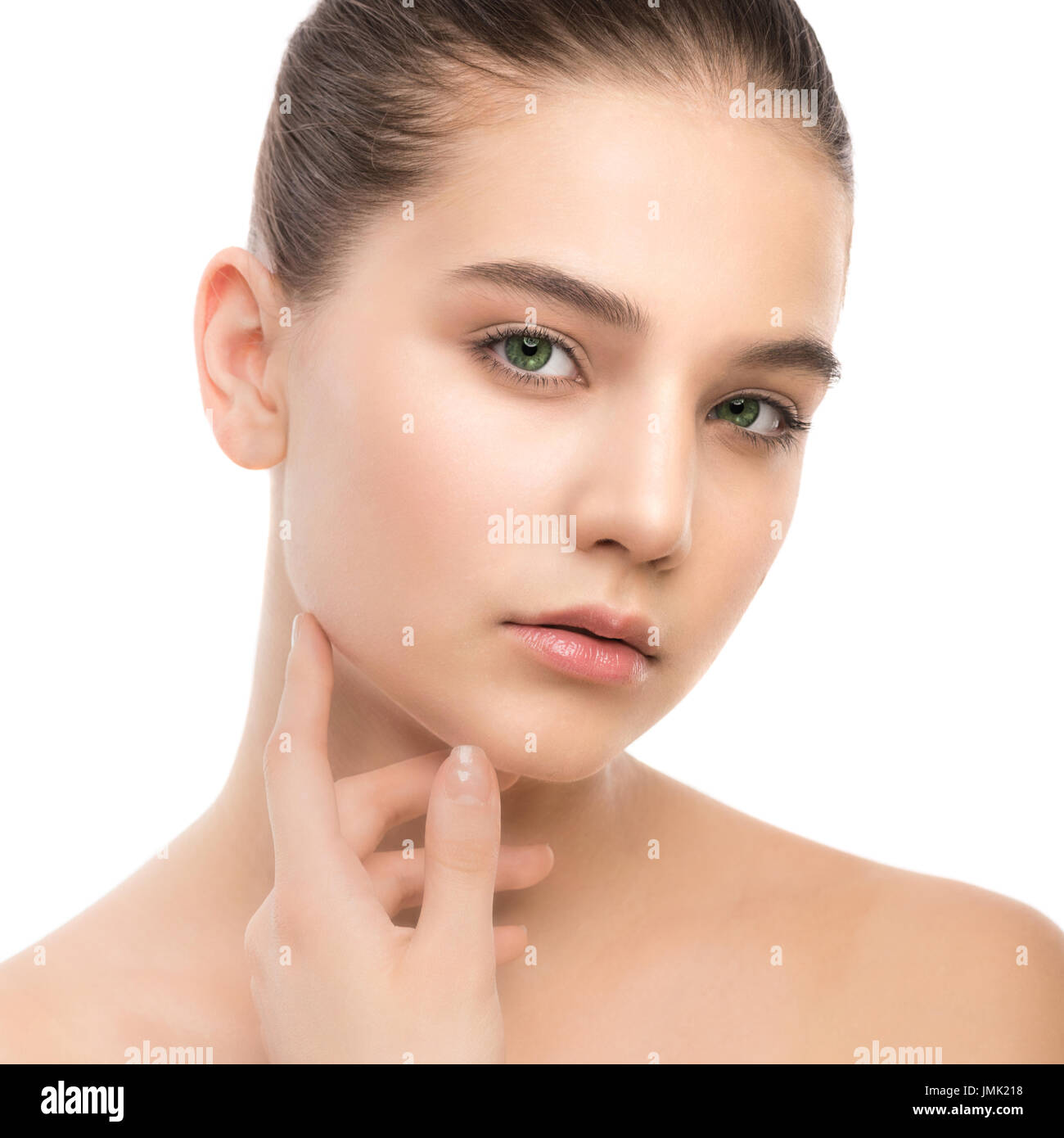 Portrait of beautiful young brunette woman with clean face. Isolated on ...