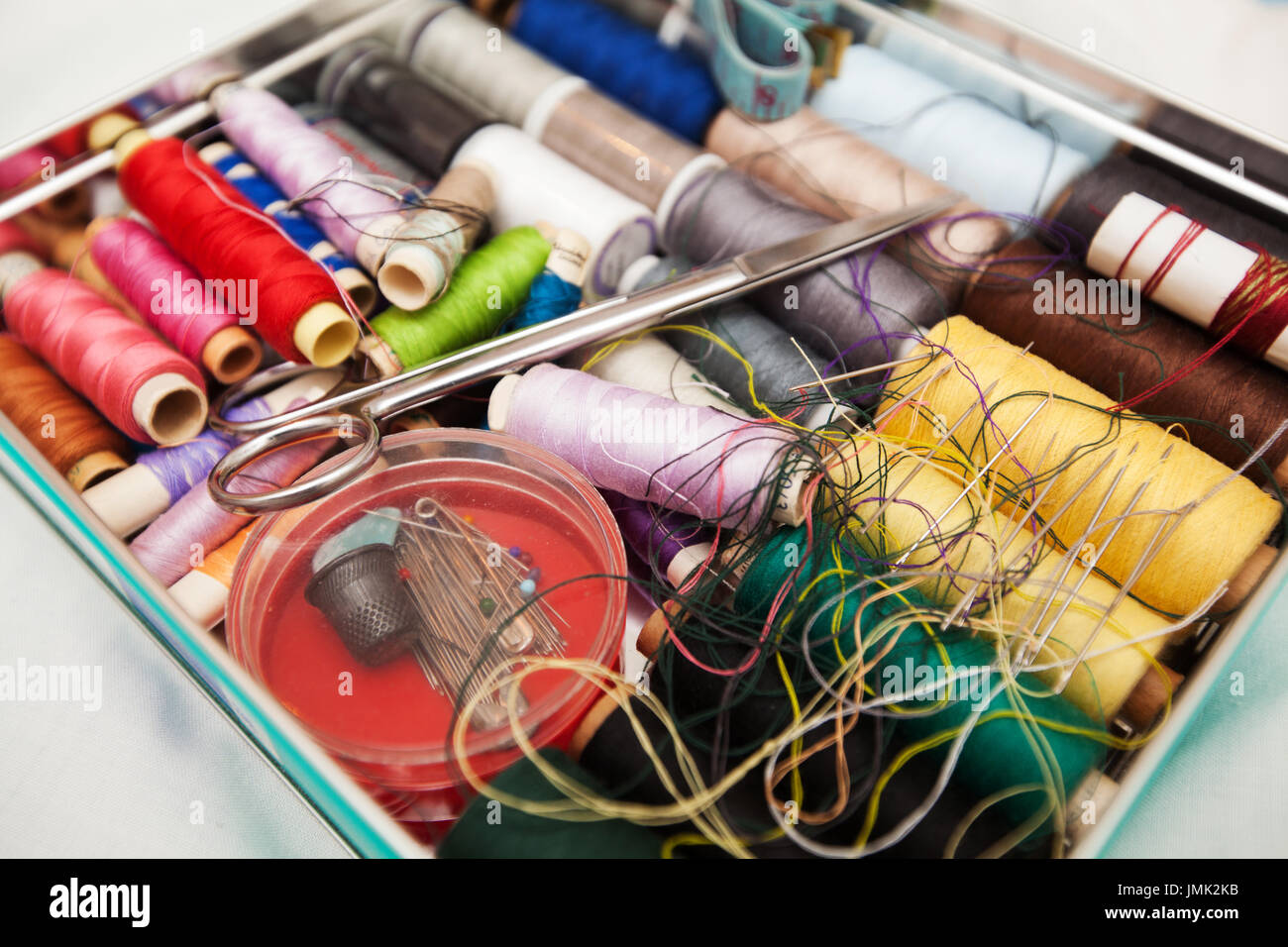 Sewing kit with scissors in the box Stock Photo - Alamy