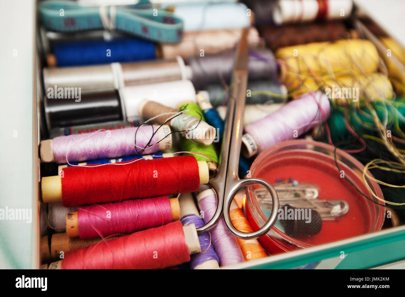 Sewing kit with scissors in the box Stock Photo - Alamy