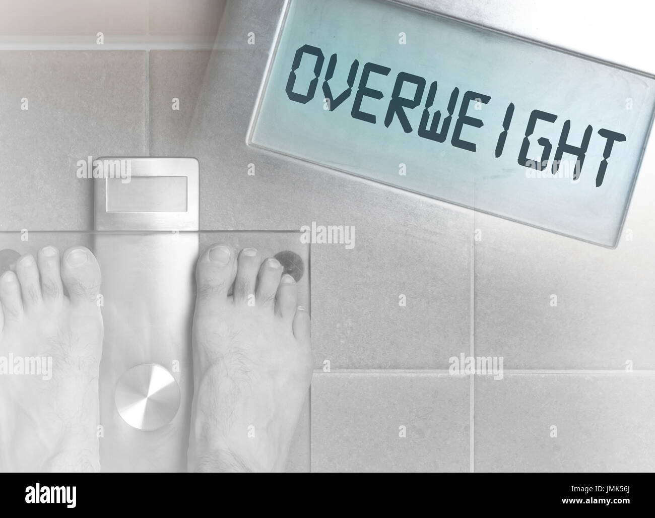 Closeup of man's feet on weight scale - Overweight Stock Photo - Alamy