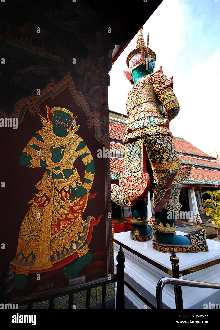 Picture of Giant statue, a guard demon stands in front of the gate, and ...