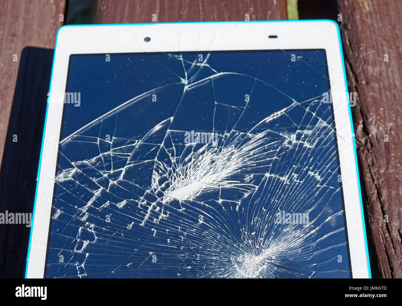 Broken tablet display Stock Photo - Alamy