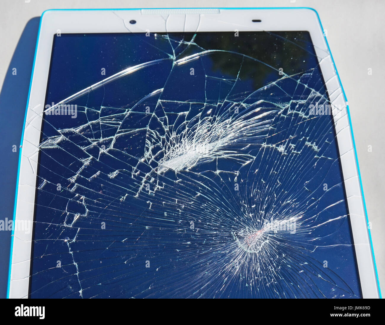 Broken display of a tablet device Stock Photo - Alamy