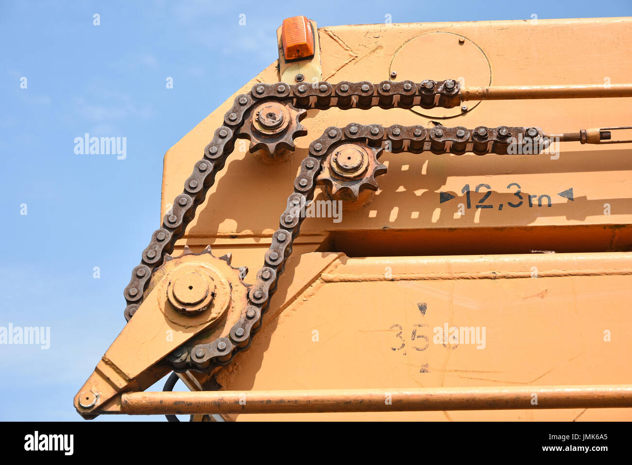 Chain drive of an old mobile crane vehicle Stock Photo - Alamy