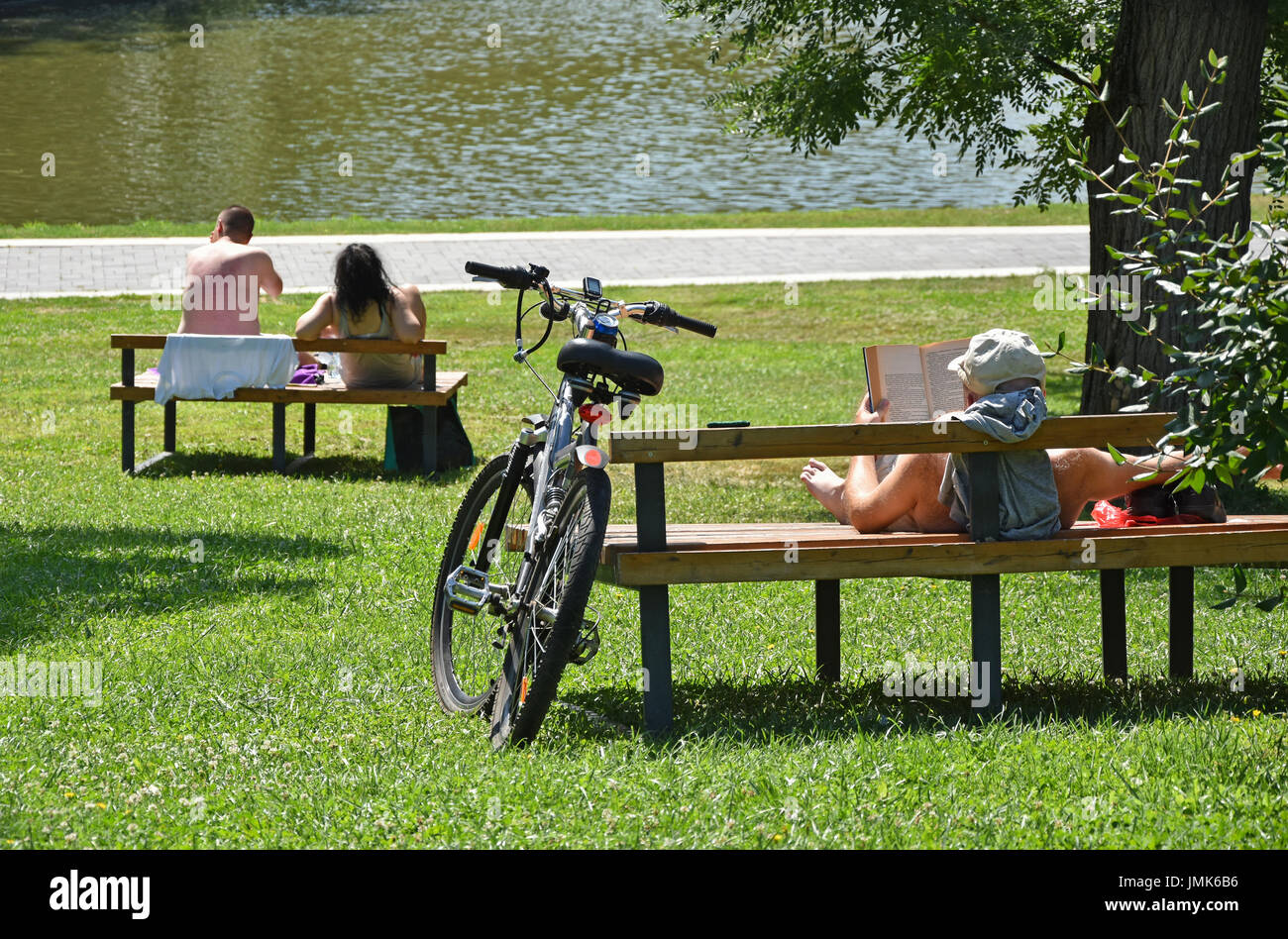 Lakeside sunbathing hi-res stock photography and images - Alamy