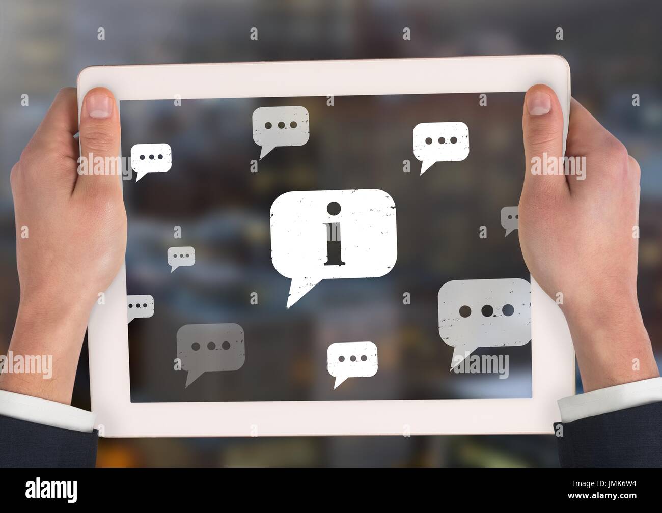 Digital composite of Holding tablet and Information and chat bubbles ...