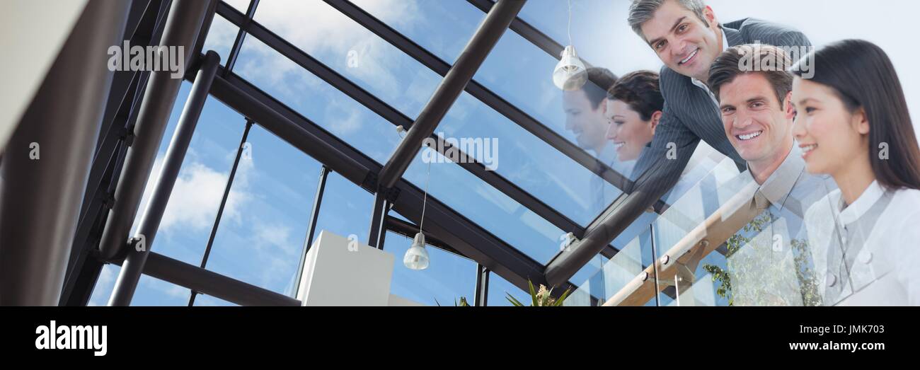 Digital composite of Happy business people using computers Stock Photo ...