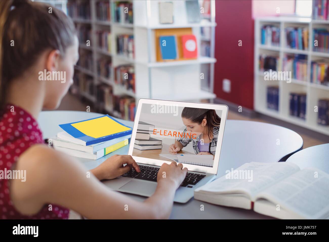 Digital composite of Woman using a computer with e-learning information ...