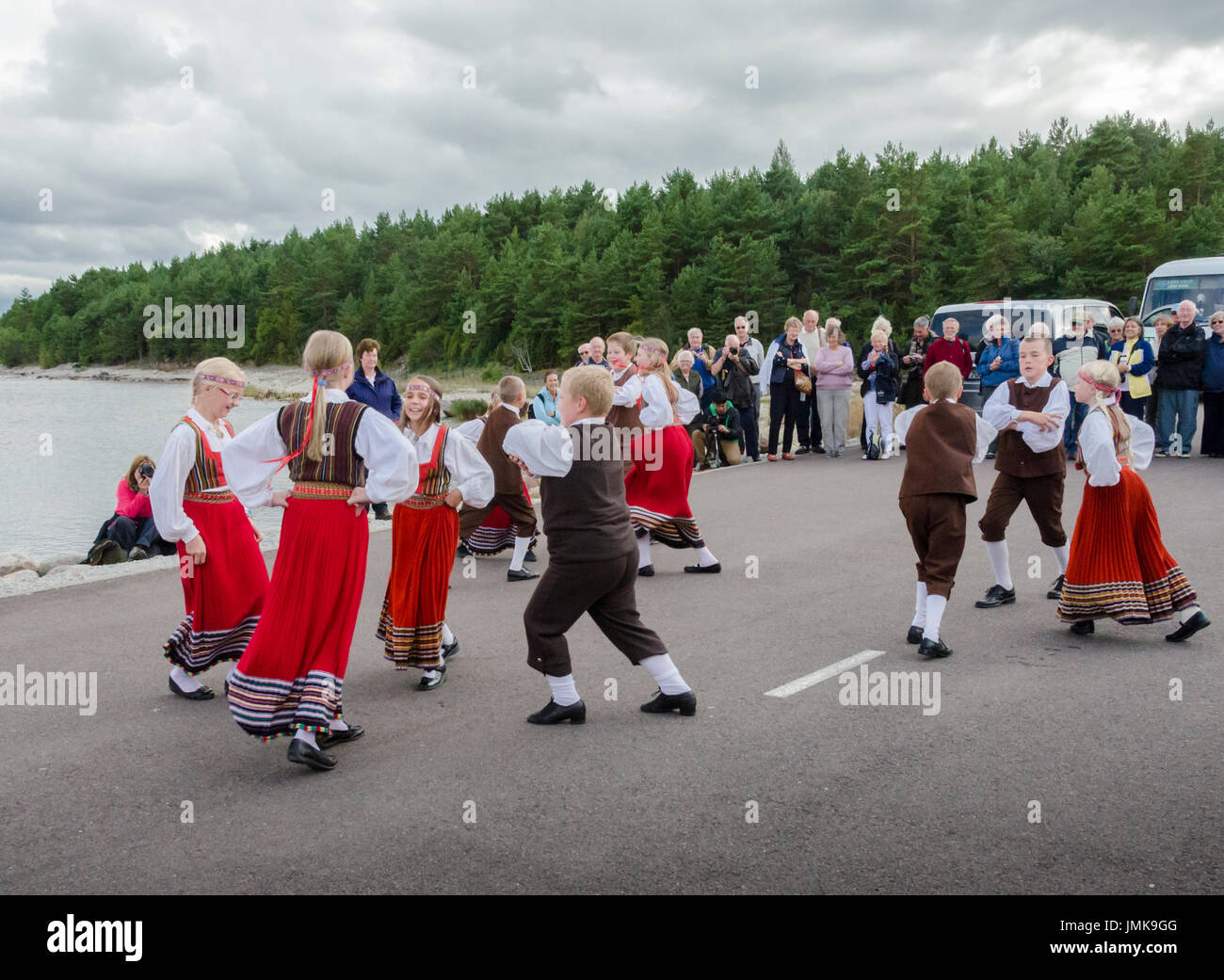 Children performing a traditional dance in Estonian national costume ...