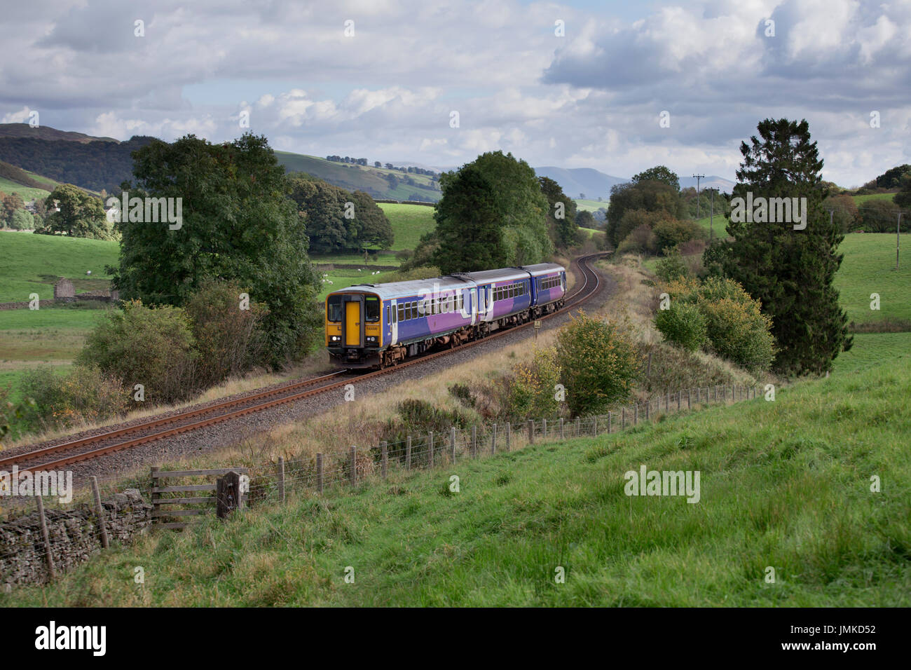 The 1226 Oxenholme - Windermere Northern rail train passes Firbank on ...