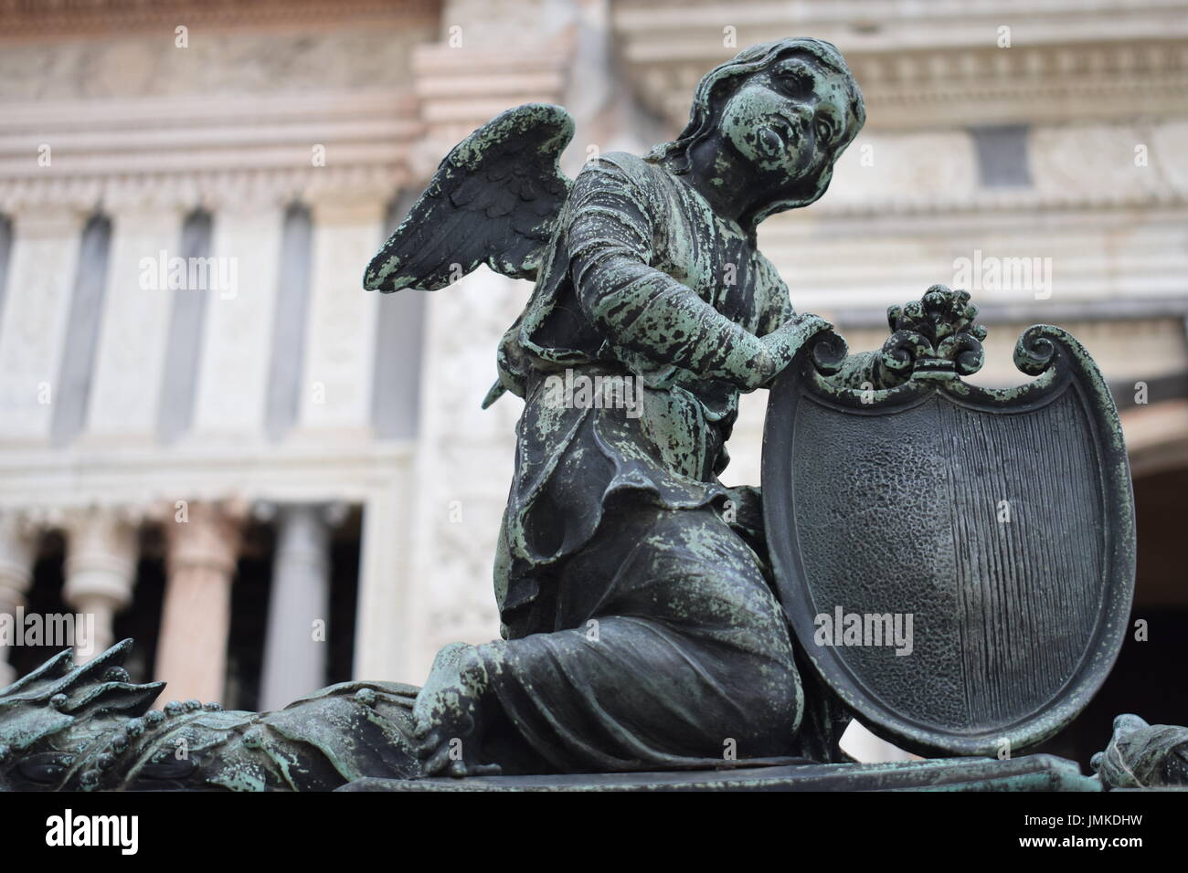 Small angel statue - a detail on the fence in front of the Bergamo ...