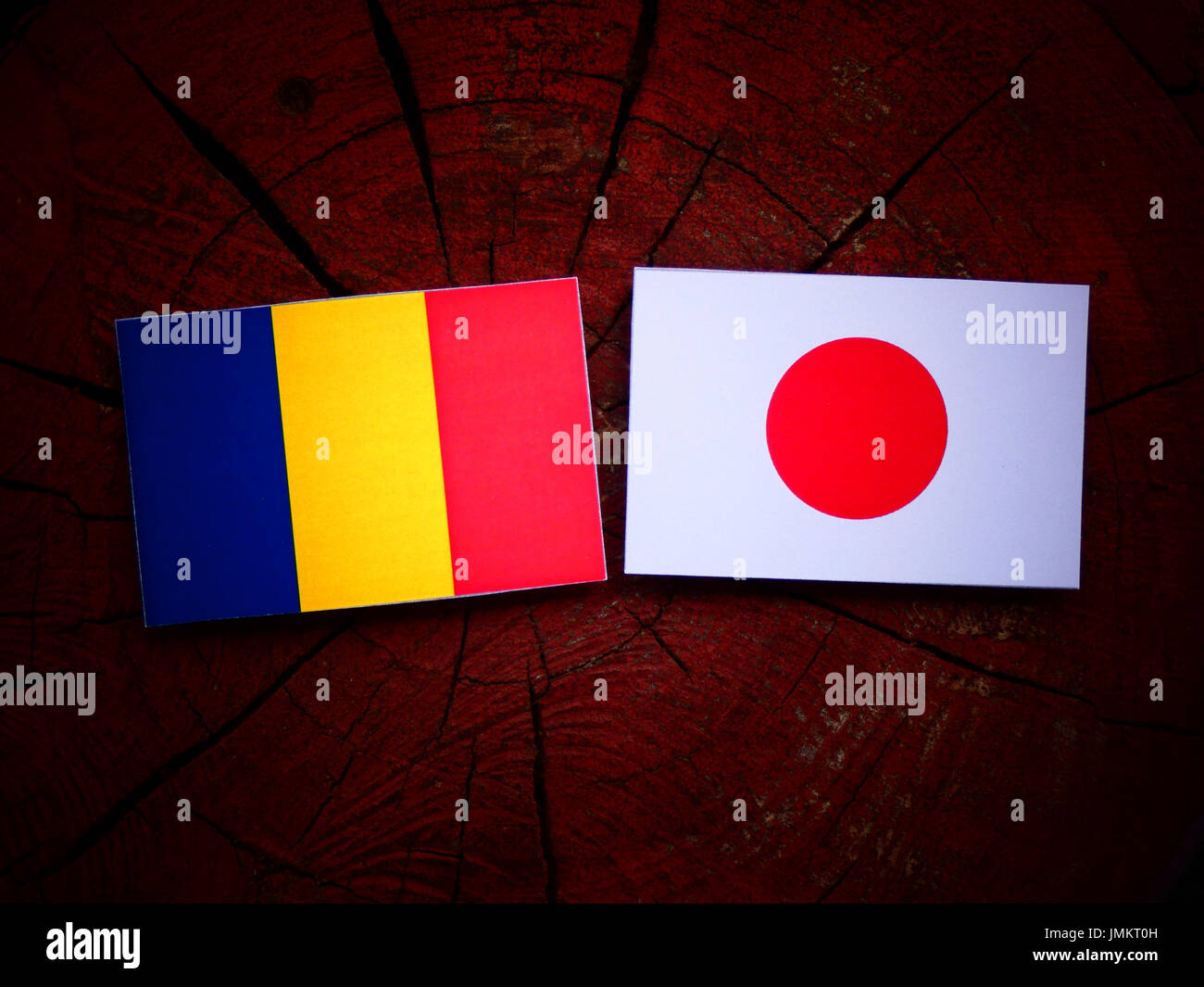 Chad flag with Japanese flag on a tree stump isolated Stock Photo - Alamy