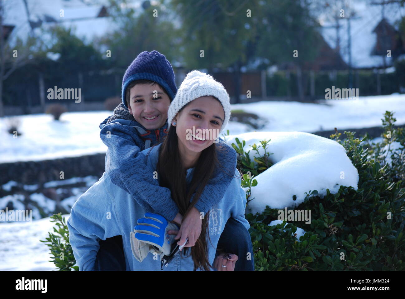 Sister carrying brother hi-res stock photography and images - Alamy