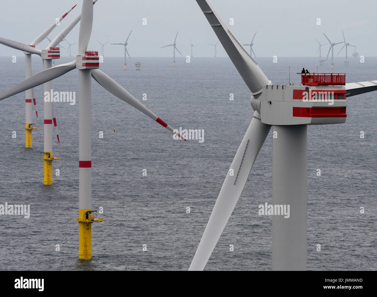 dpatop - Technicians enter the lower work platform of a wind turbine of ...