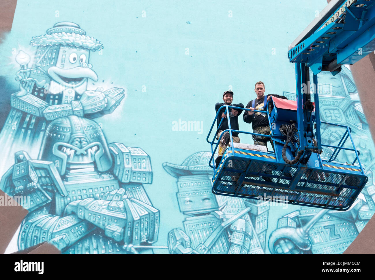 Munich, Germany. 28th July, 2017. The Graffiti artists Loomit (L) and ...