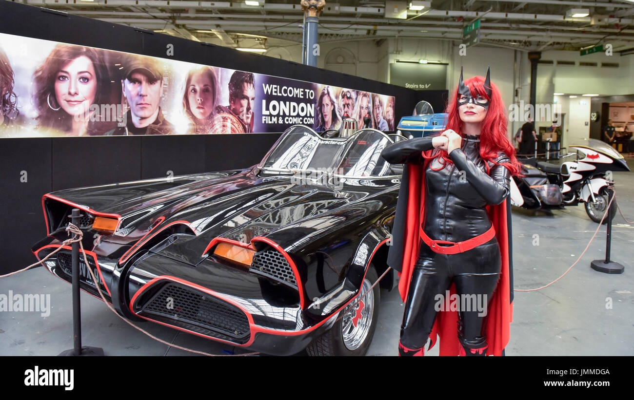 London, UK. 28 July 2017. A woman dressed as Batgirl poses with the ...