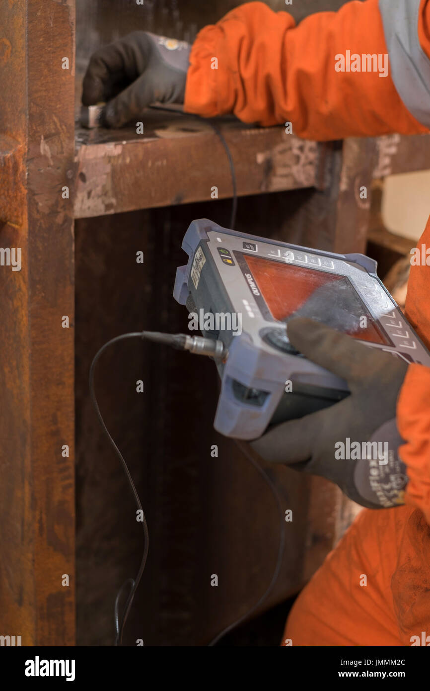 NDT inspector, weld thickness checking, on a north sea oil and gas ...
