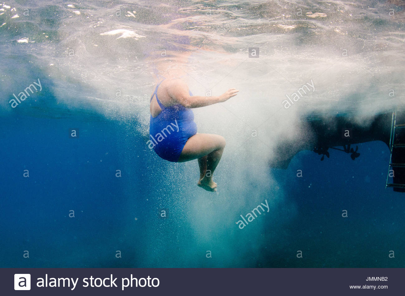 Woman Diving Into Water Stock Photos & Woman Diving Into Water Stock ...