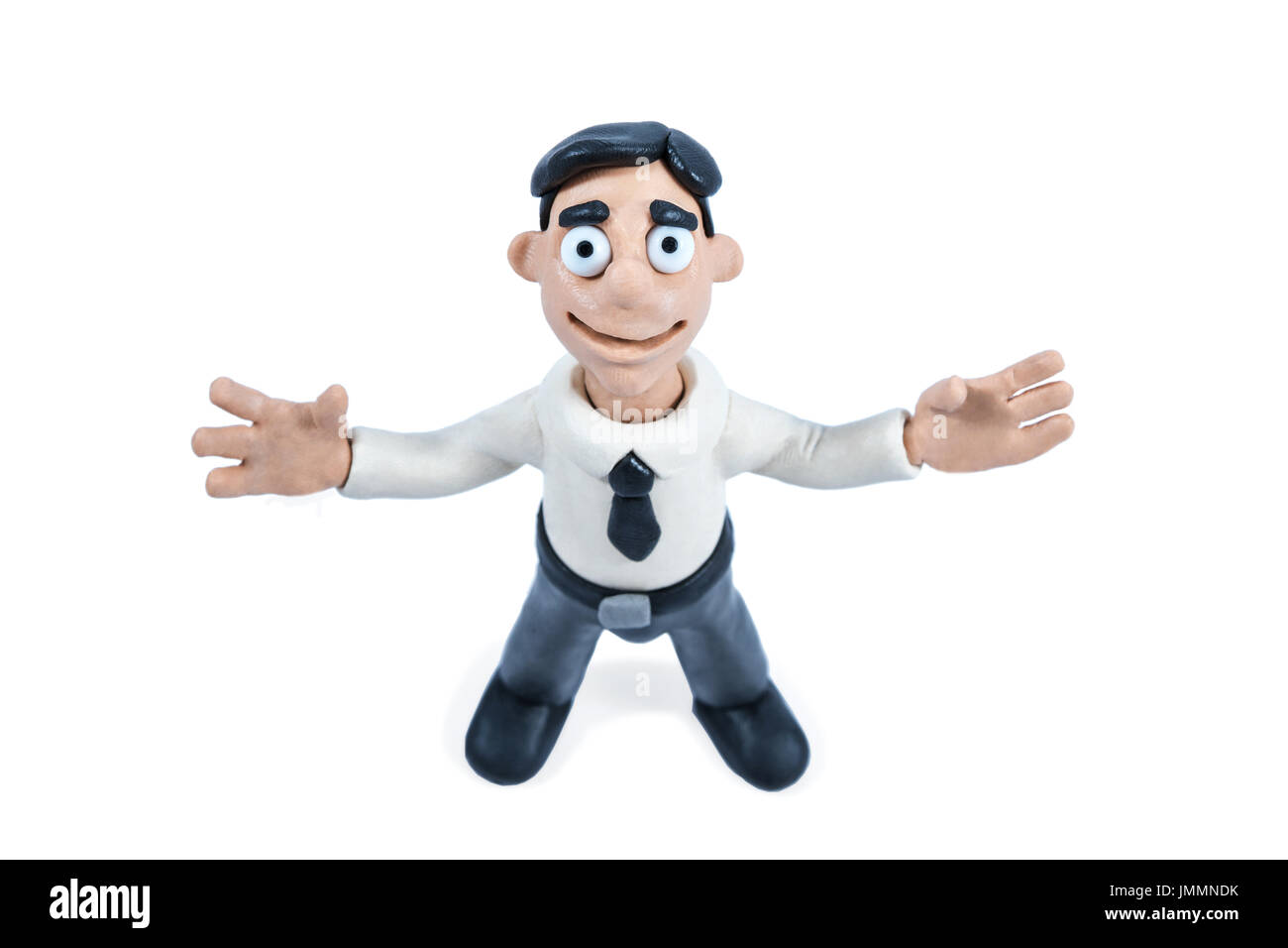 Plasticine businessman looking up at the camera isolated on white ...