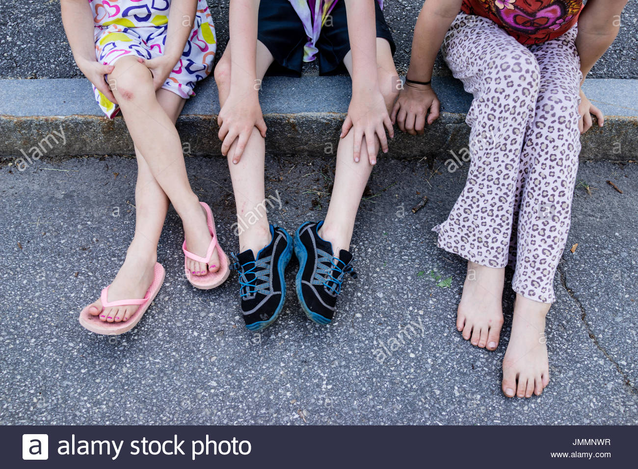 Sitting On The Curb Stock Photos & Sitting On The Curb Stock Images - Alamy