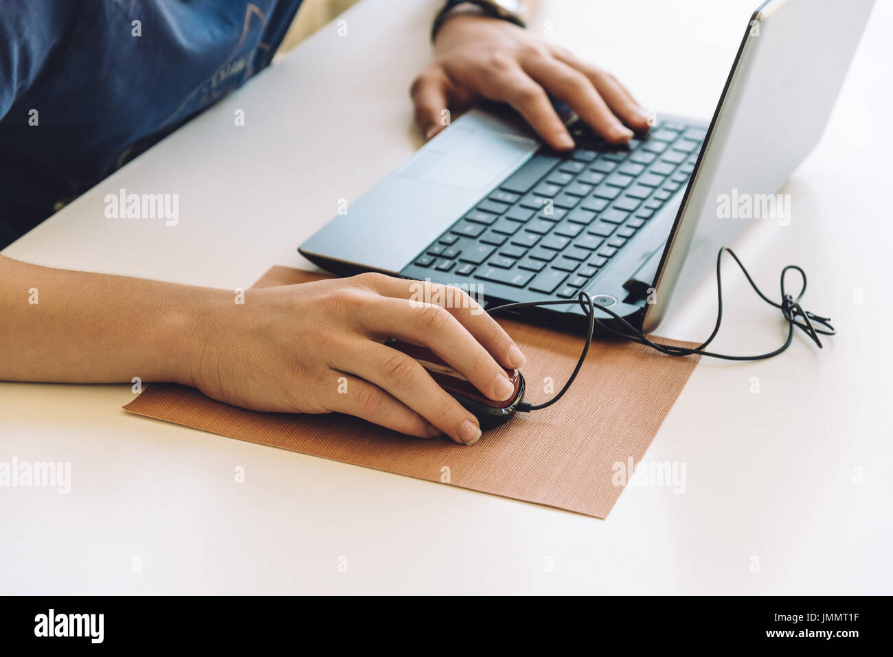 Hand on computer mouse young adult hi-res stock photography and images ...