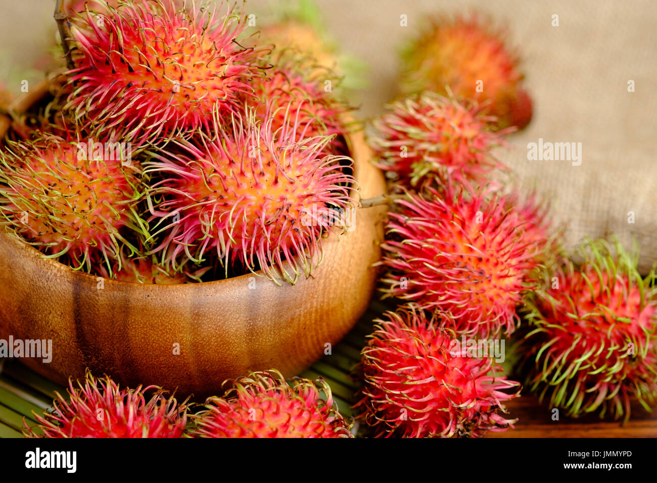 Red hairy fruits hi-res stock photography and images - Alamy