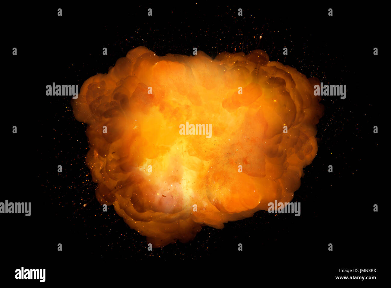 Realistic bomb explosion, orange color with sparks isolated on black ...