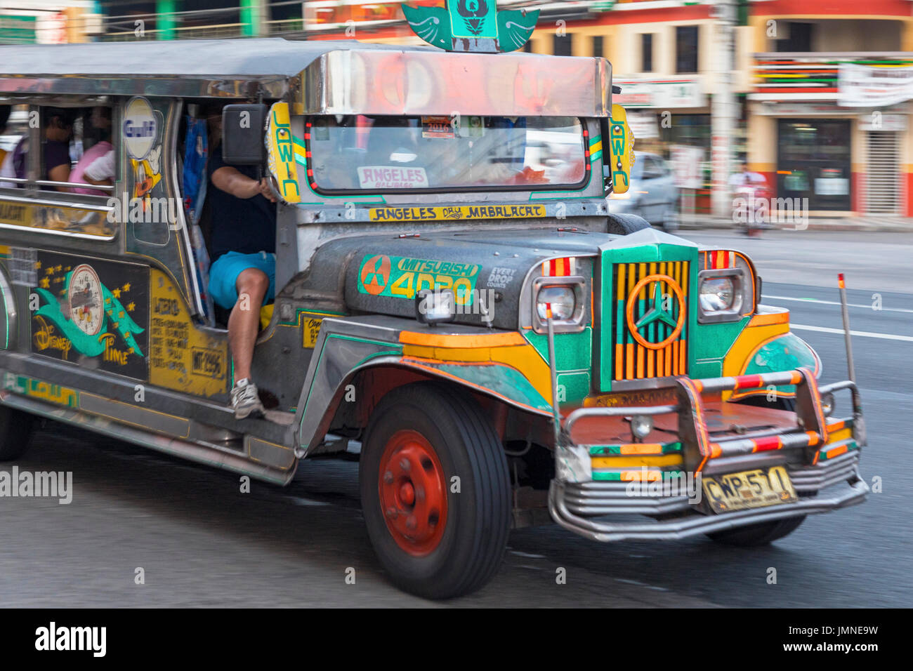 Jeepney and passengers, Angeles City, Pampanga, Philippines Stock Photo ...