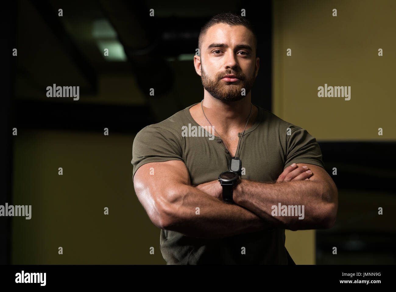 Portrait Of A Young Physically Fit Man Showing His Well Trained Body In ...