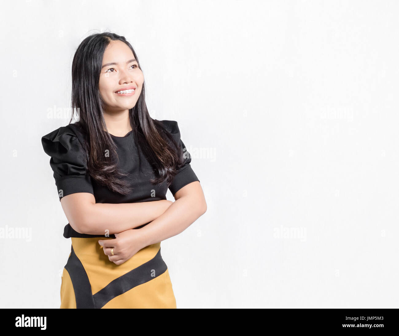 Portrait of a beautiful asian woman smiling and cross one 'arms ...